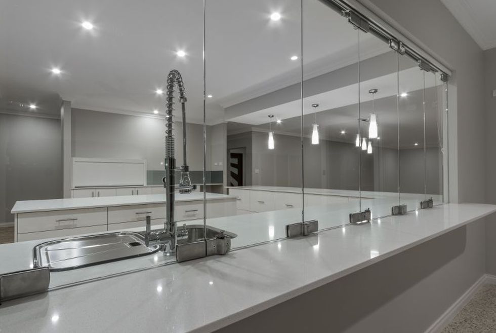 Frameless bi-folds from JH Glass Innovation | ArchitectureAu